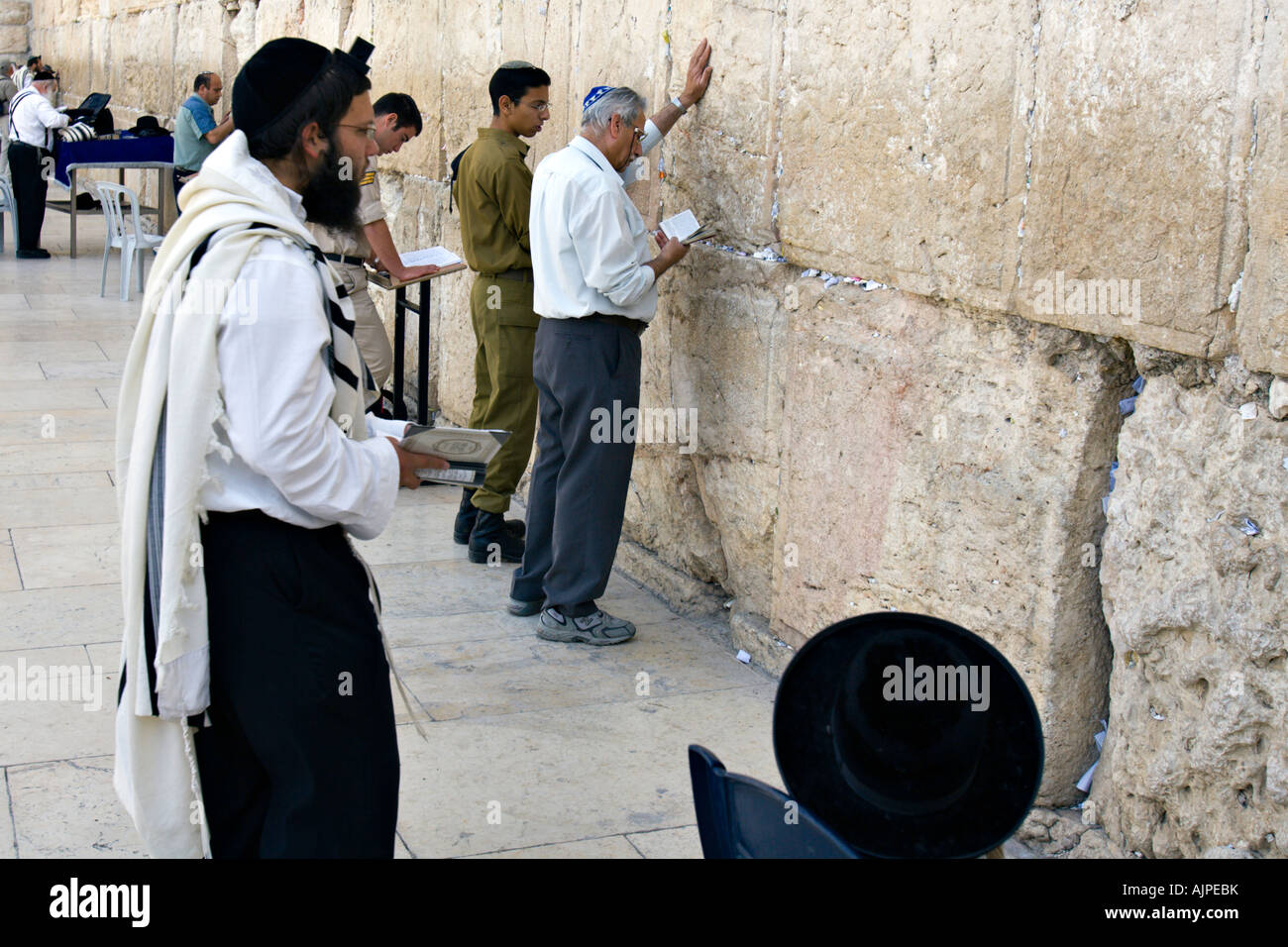 ISRAEL JERUSALEM Men praying at the Wailing Wall or Western Wall Stock ...