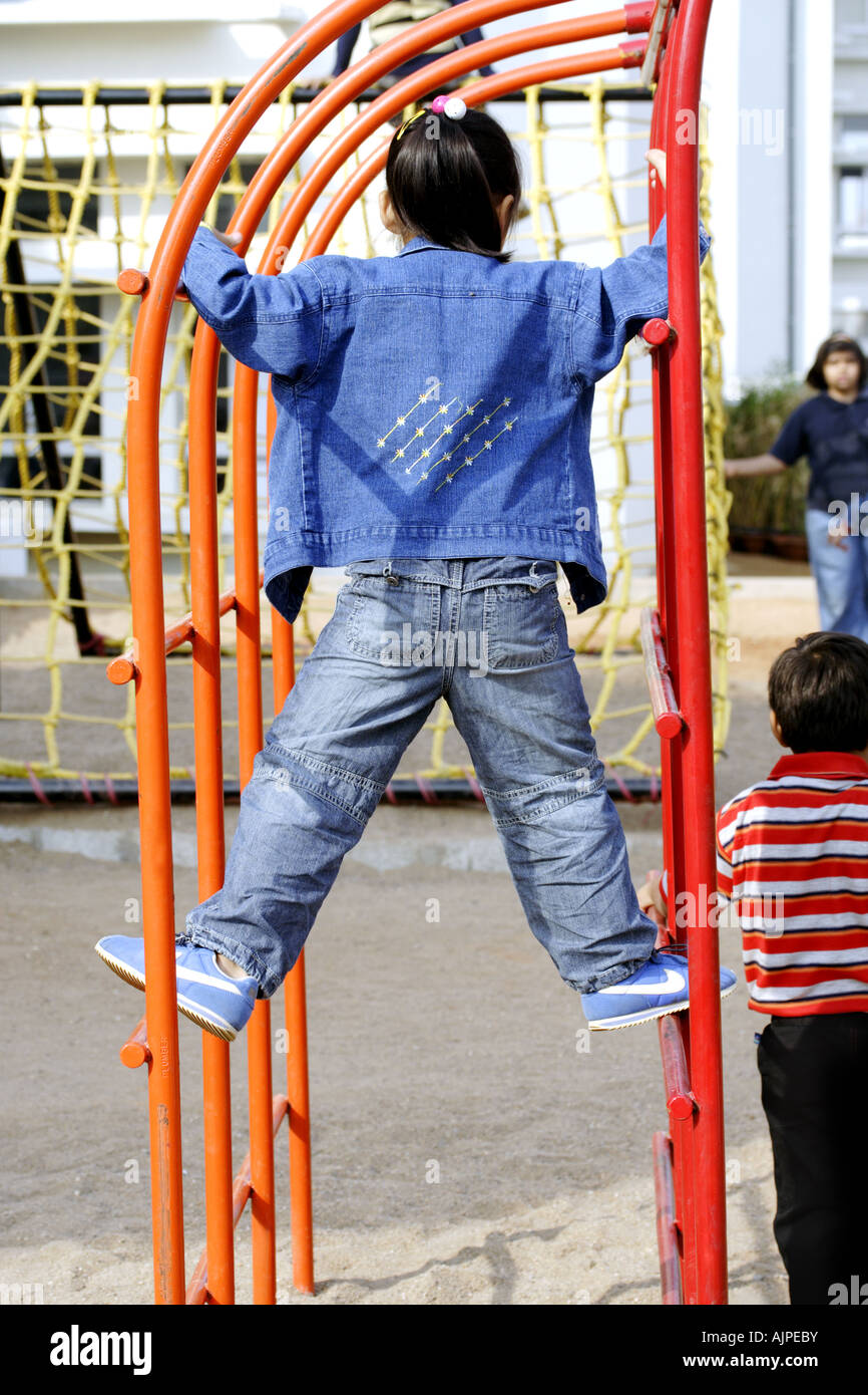 Kids playing in a park Stock Photo - Alamy