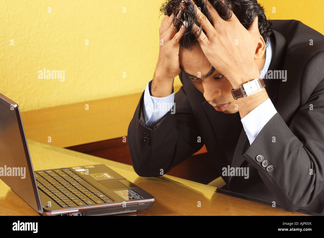A stressed out business man Stock Photo - Alamy