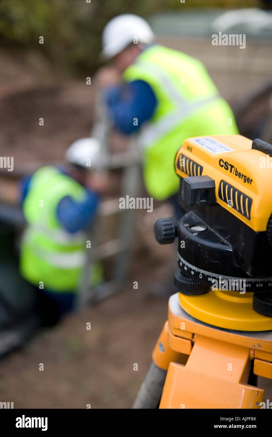 Surveying on a building site Stock Photo - Alamy