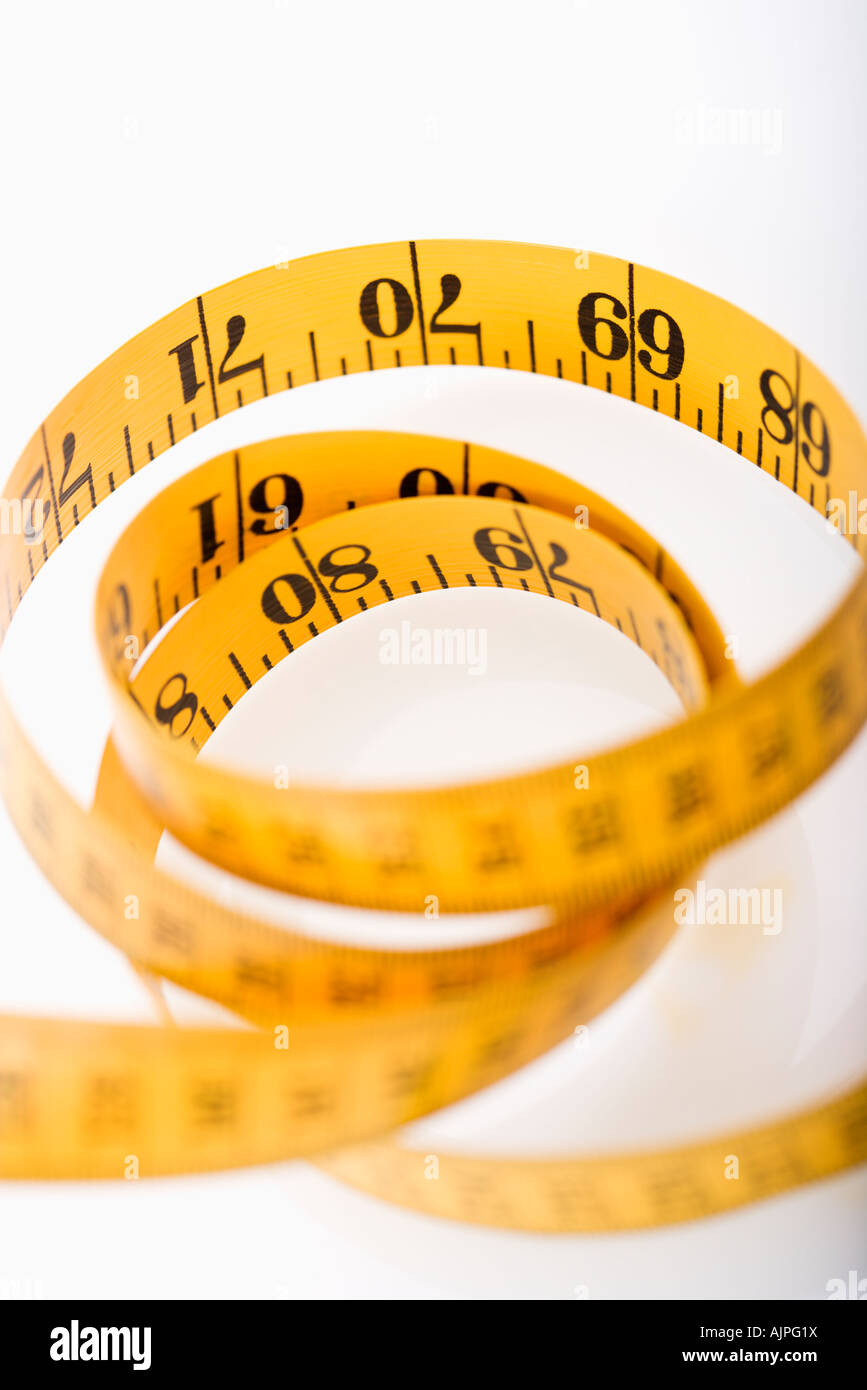 Measuring tape in a pile Stock Photo - Alamy