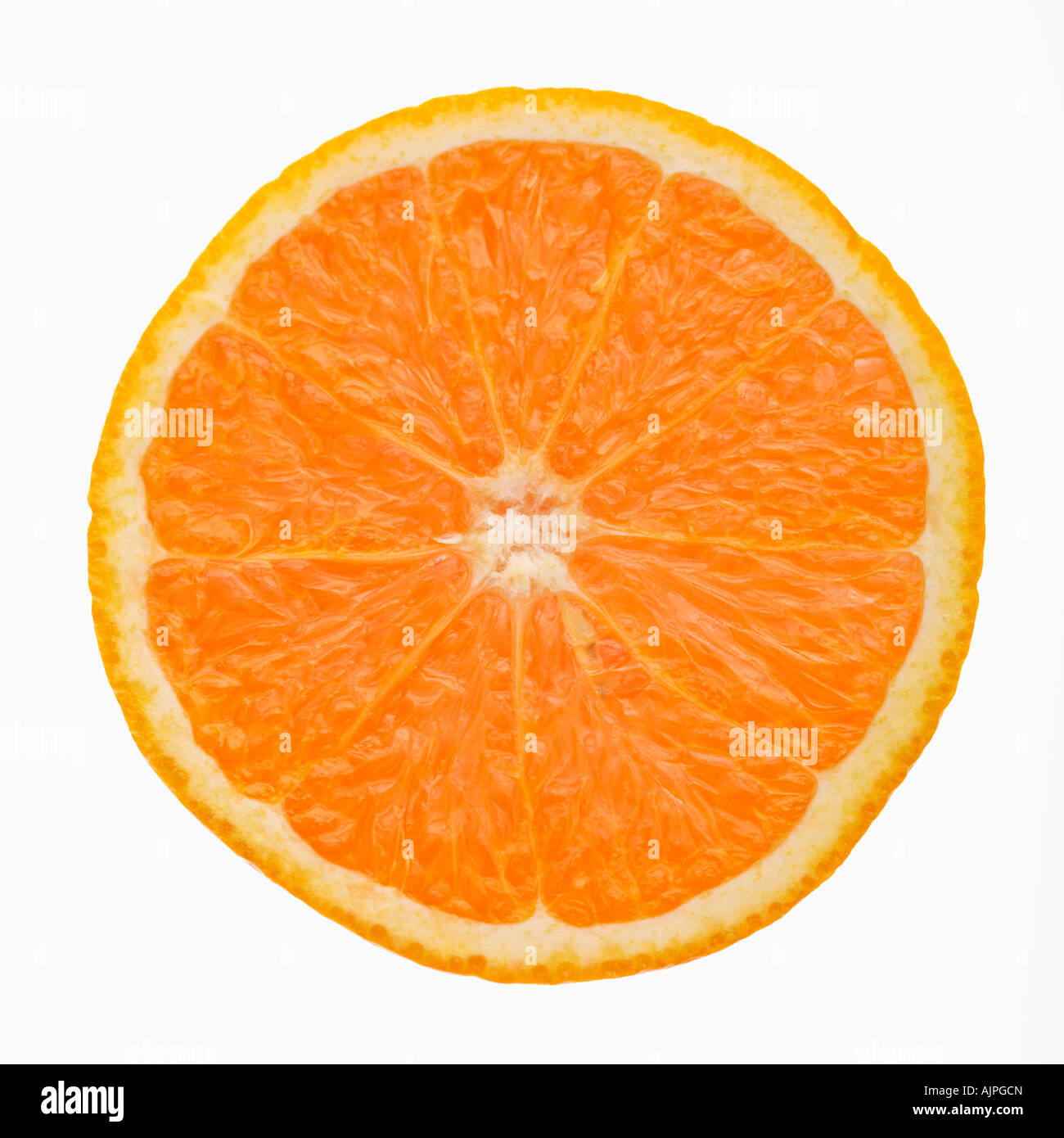 Single orange slice side view against white background Stock Photo - Alamy