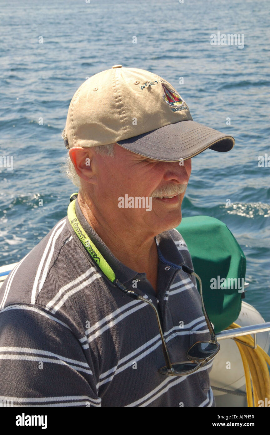 Retired man on his sailboat in the Puget Sound Stock Photo - Alamy