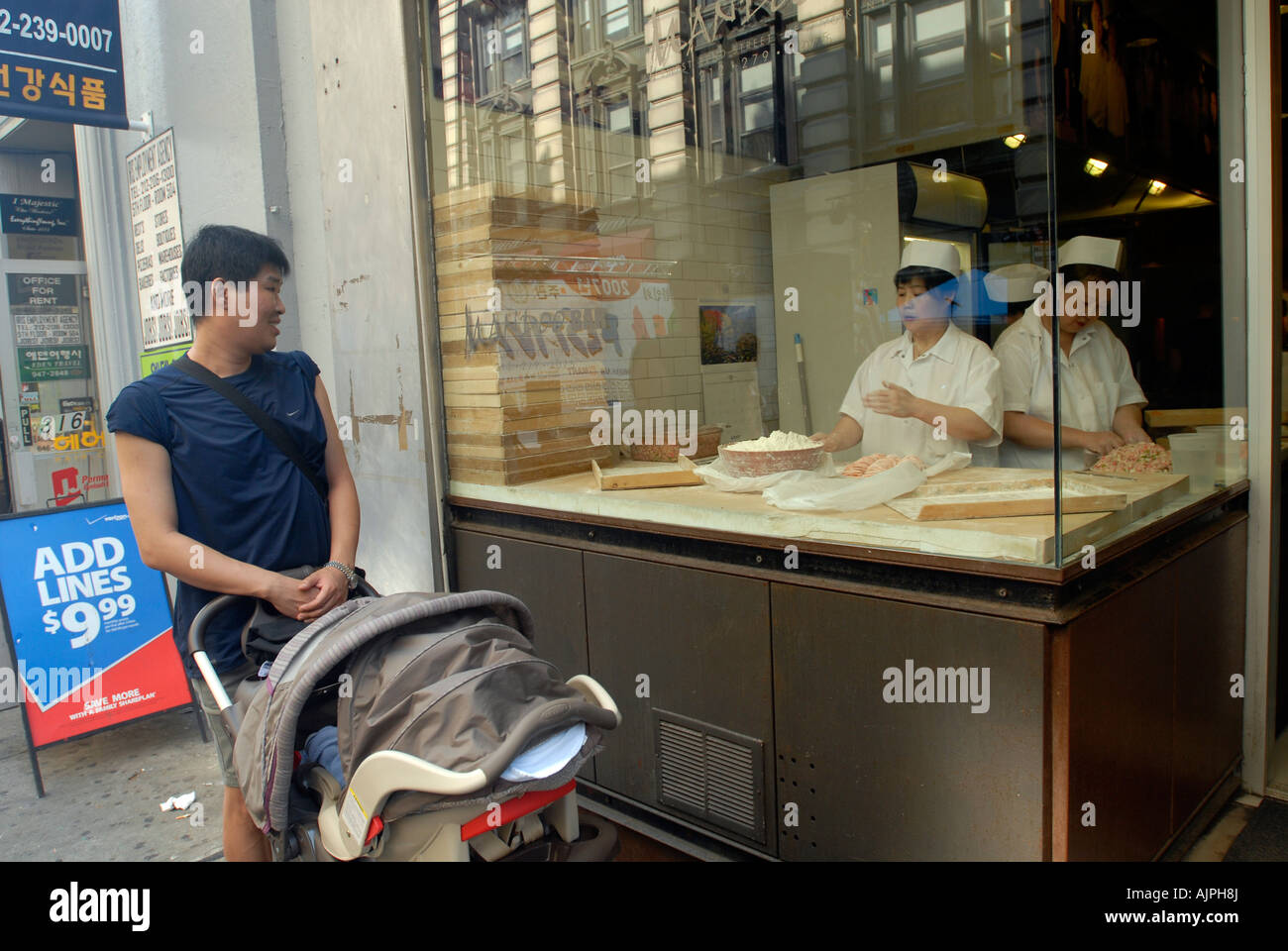 Workers in the window of the Mandoo Bar in Koreatown on West 32nd ...