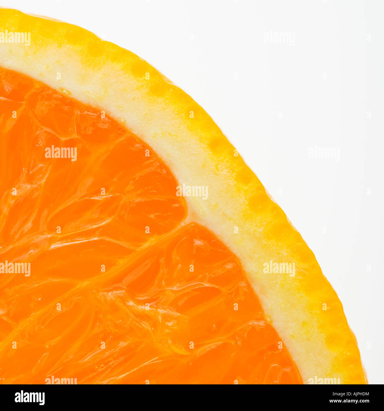 Close up of halved orange against white background Stock Photo - Alamy