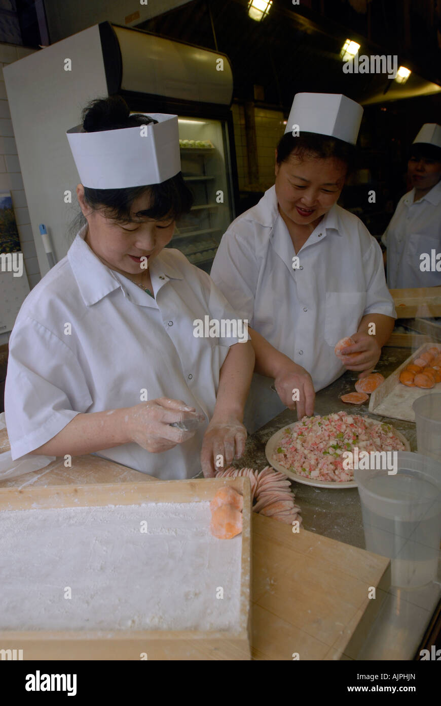 Workers in the window of the Mandoo Bar in Koreatown on West 32nd ...