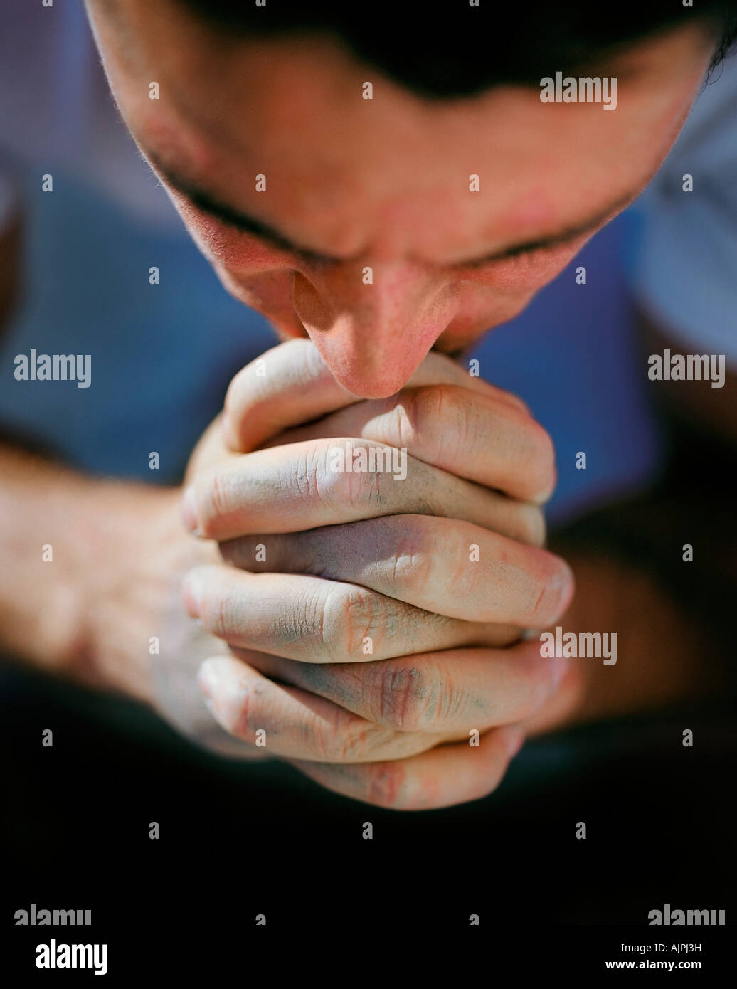 A man praying Stock Photo - Alamy