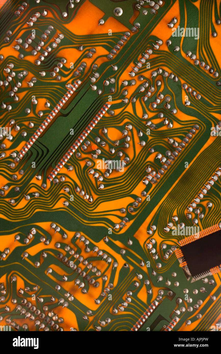 Orange circuit board detail Stock Photo - Alamy