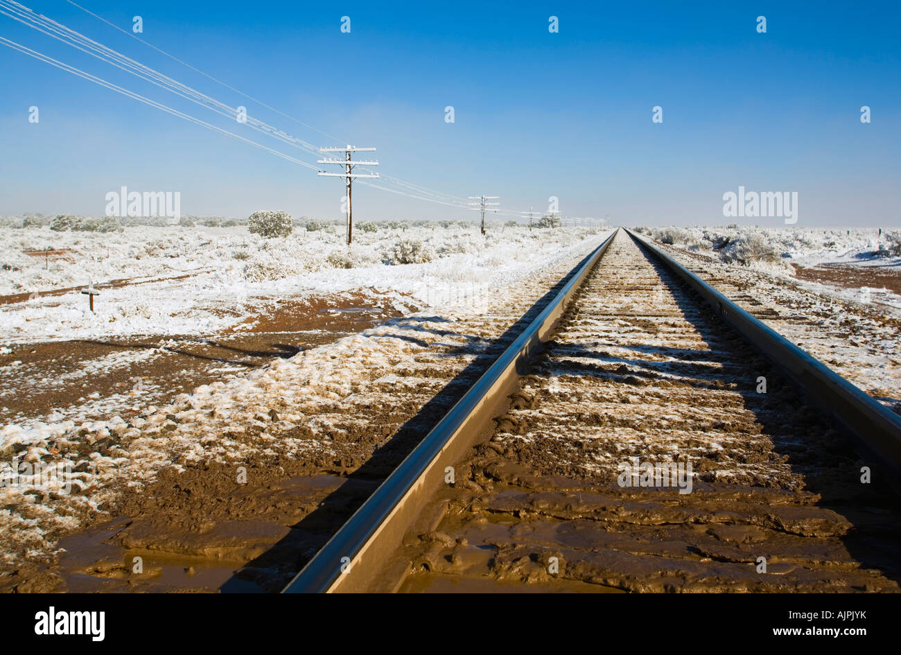 Railroad tracks covered with snow Stock Photo - Alamy