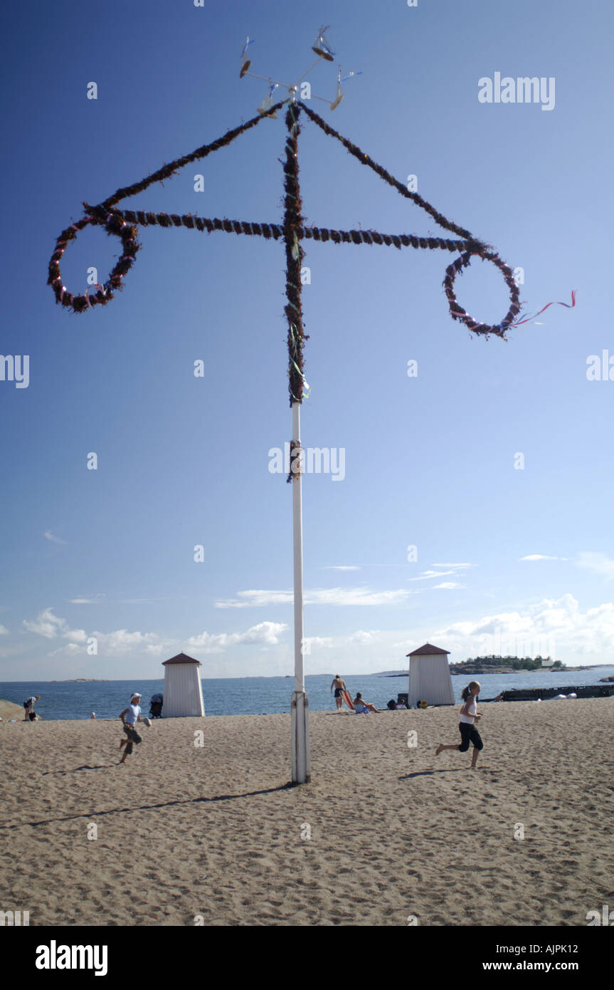 Maypole on the beach at Hanko Finland with a clear blue sky Stock Photo ...
