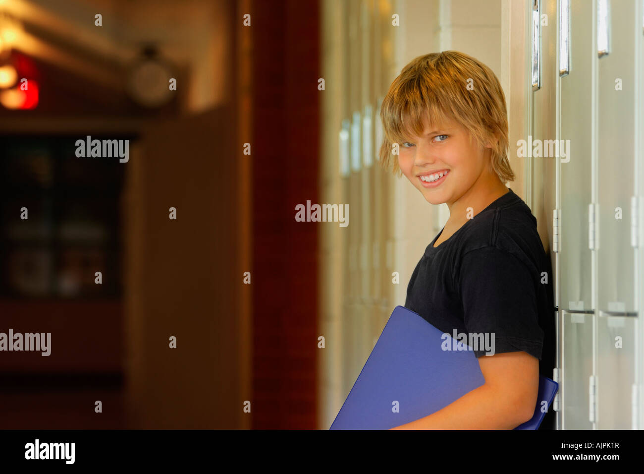 Child with binder Stock Photo - Alamy