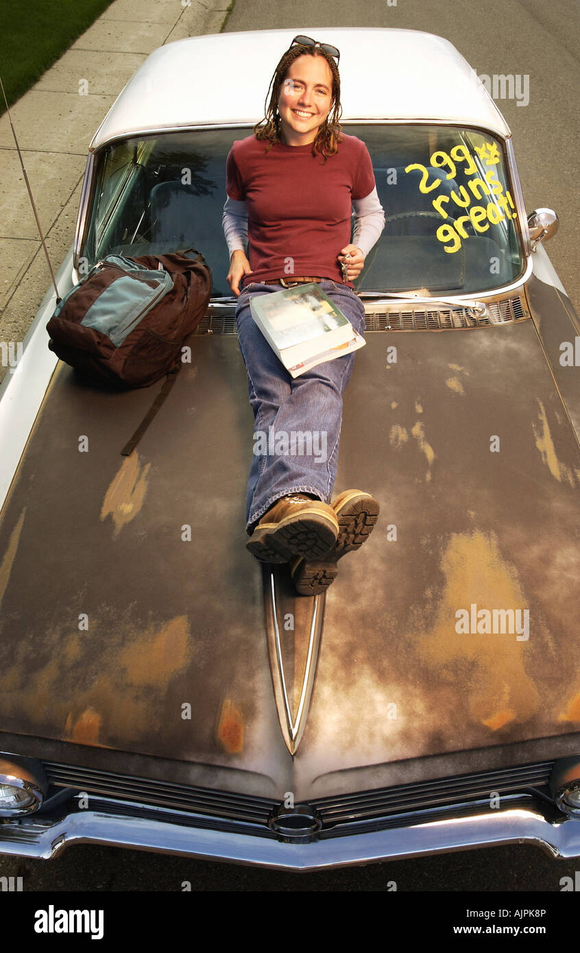 Girl smile car bonnet hi-res stock photography and images - Alamy