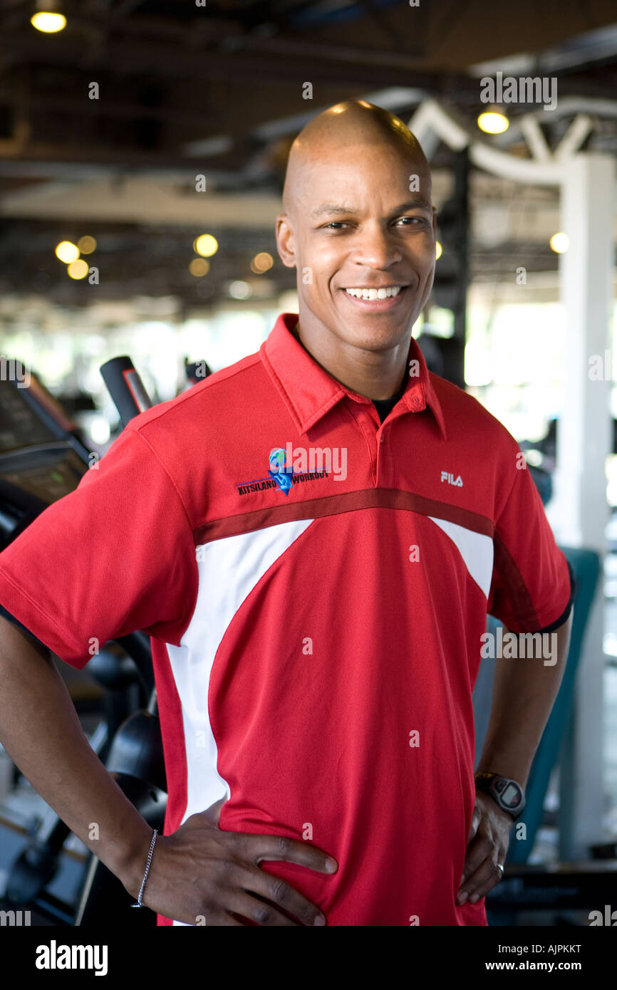 fitness personal trainer posing in a gym Stock Photo - Alamy