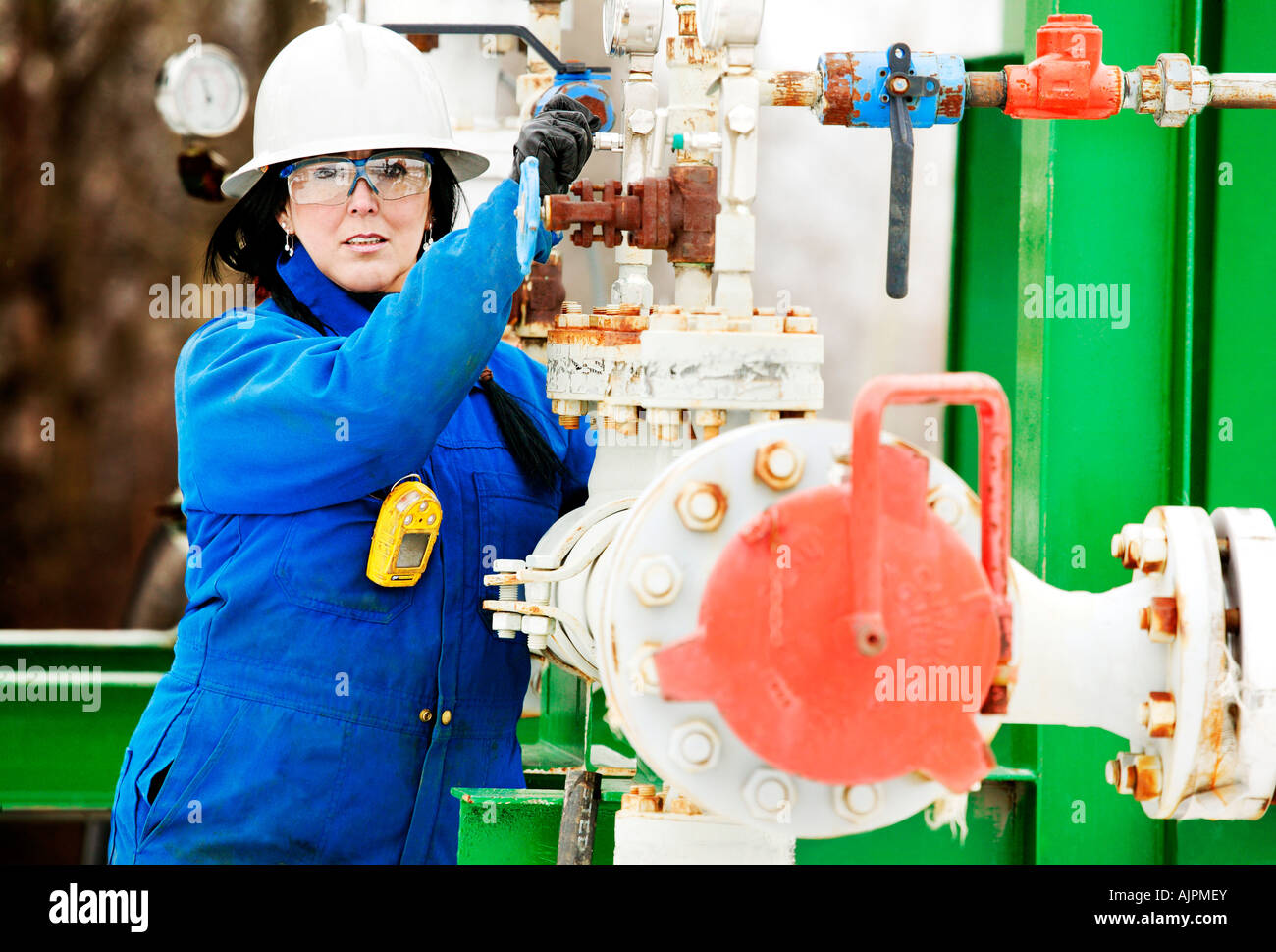 Woman working on an boiler system Stock Photo - Alamy