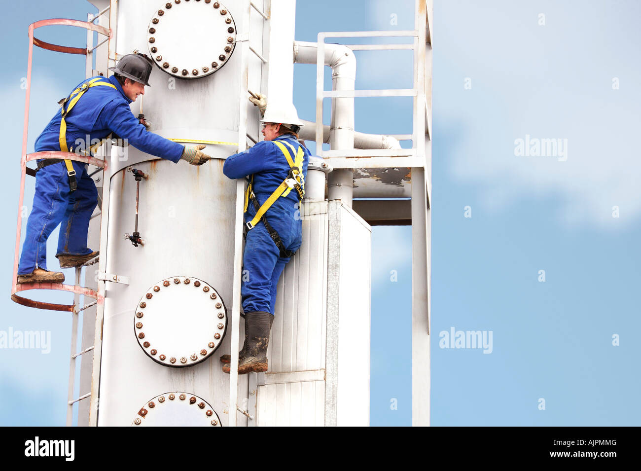 Male engineers working on oilfield hi-res stock photography and images ...