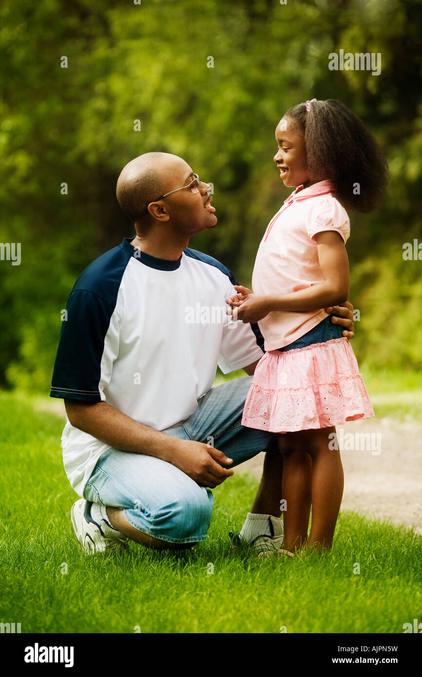 Father speaking with daughter Stock Photo - Alamy