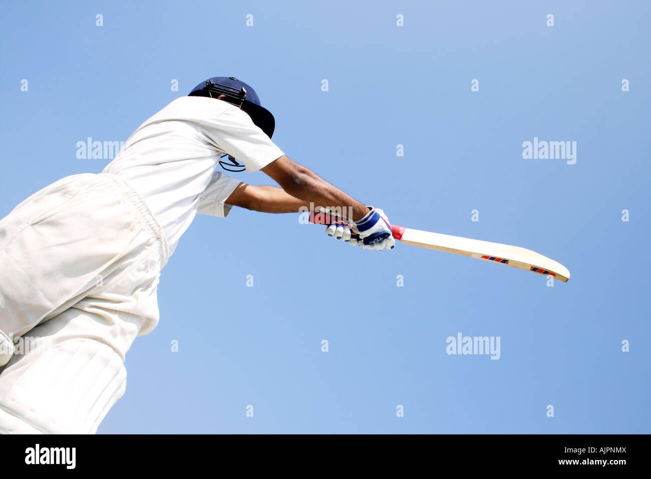 Batsman holding a bat Stock Photo - Alamy