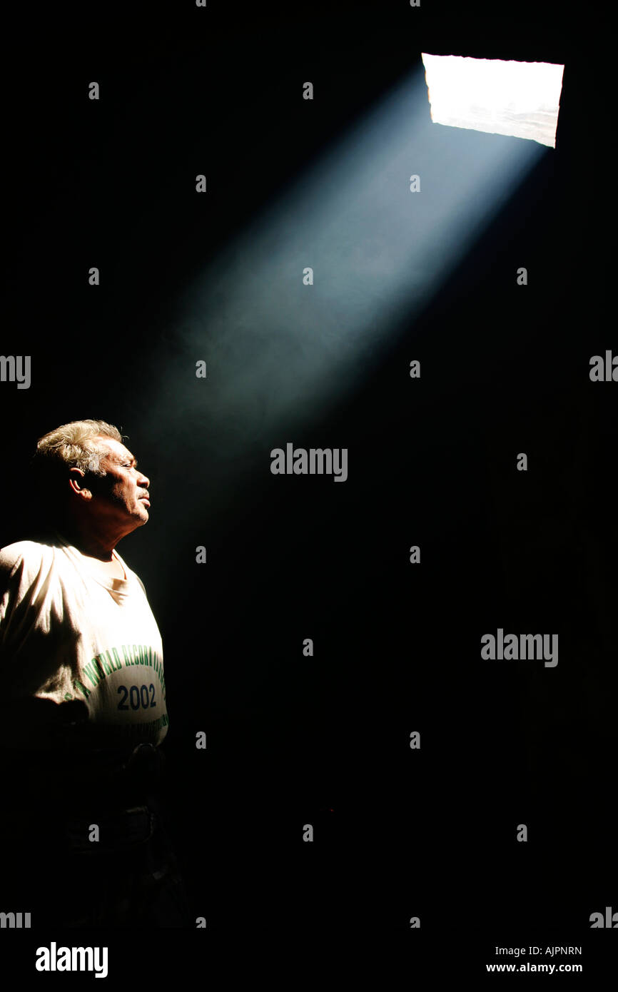 Man in prison beam of light hi-res stock photography and images - Alamy