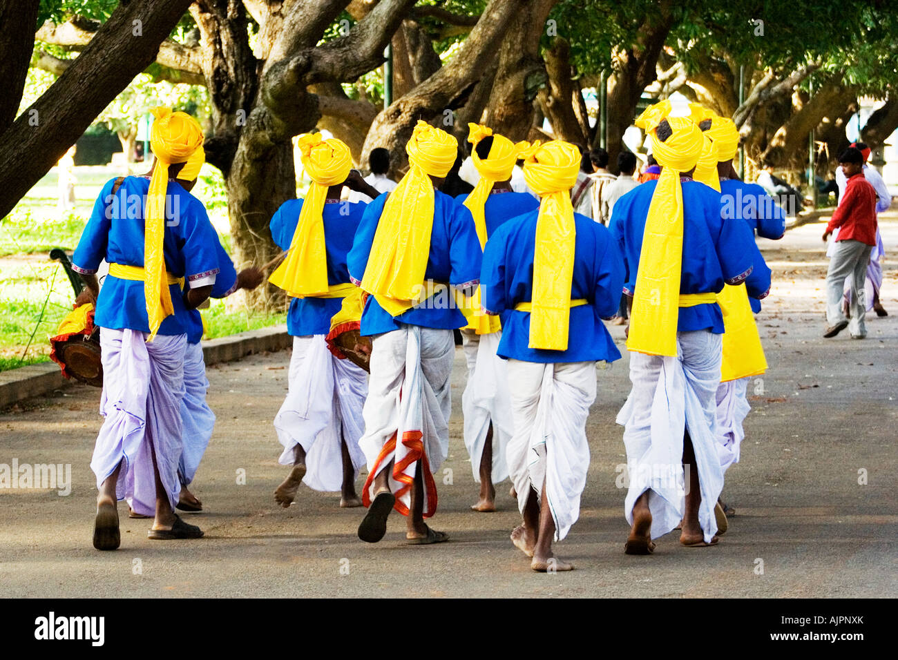 Rear view of a band walking Stock Photo - Alamy
