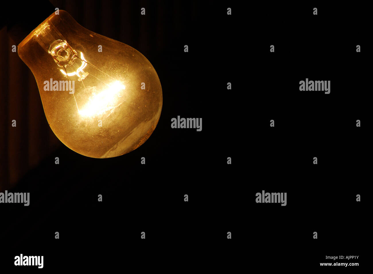 A light bulb at night Stock Photo - Alamy
