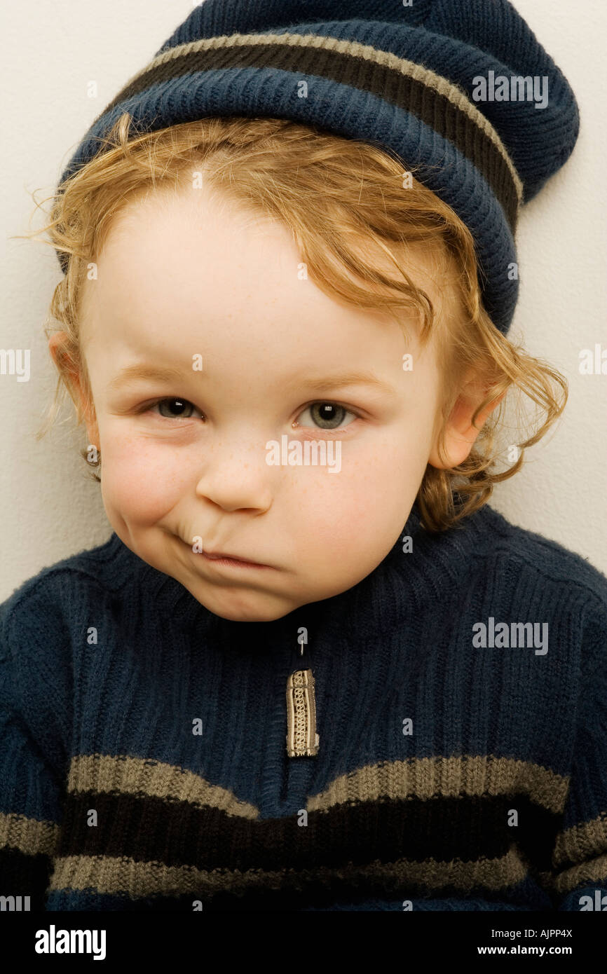 Young boy making faces Stock Photo - Alamy