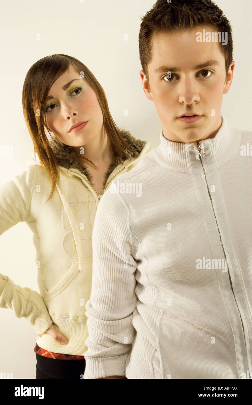 Two young adults modelling Stock Photo - Alamy