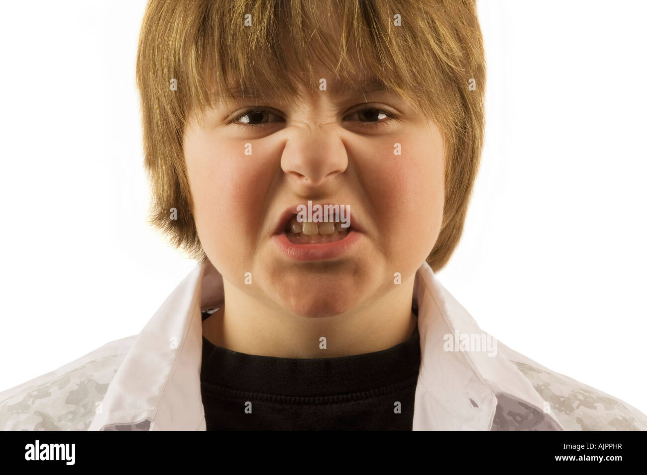 Young boy making silly face Stock Photo - Alamy