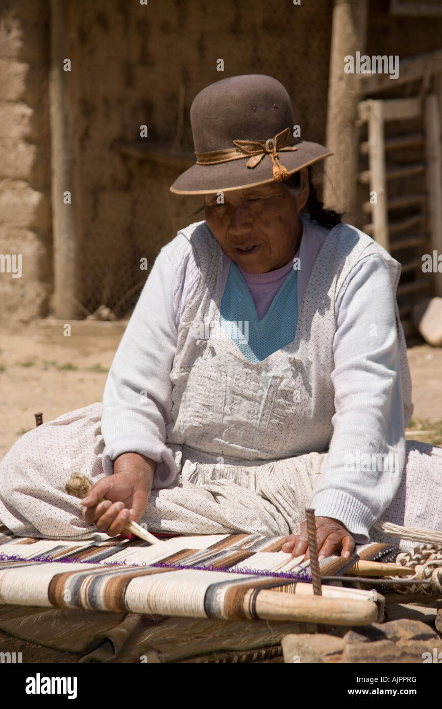 Aymara woman weaving at the Andean Roots Eco Village at the Inca Utama ...