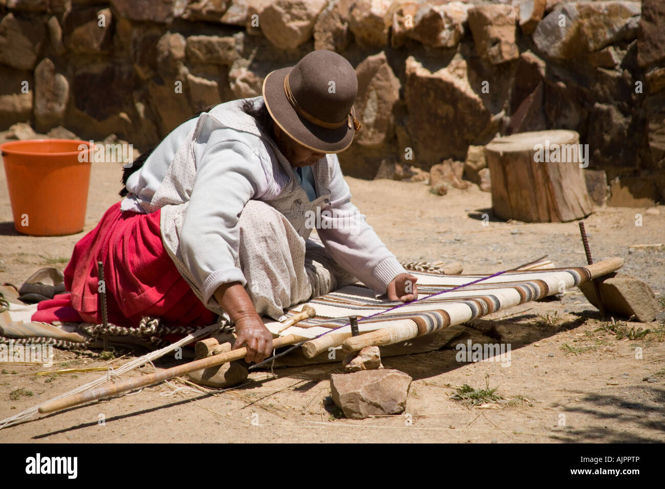 Aymara woman weaving at the Andean Roots Eco Village at the Inca Utama ...