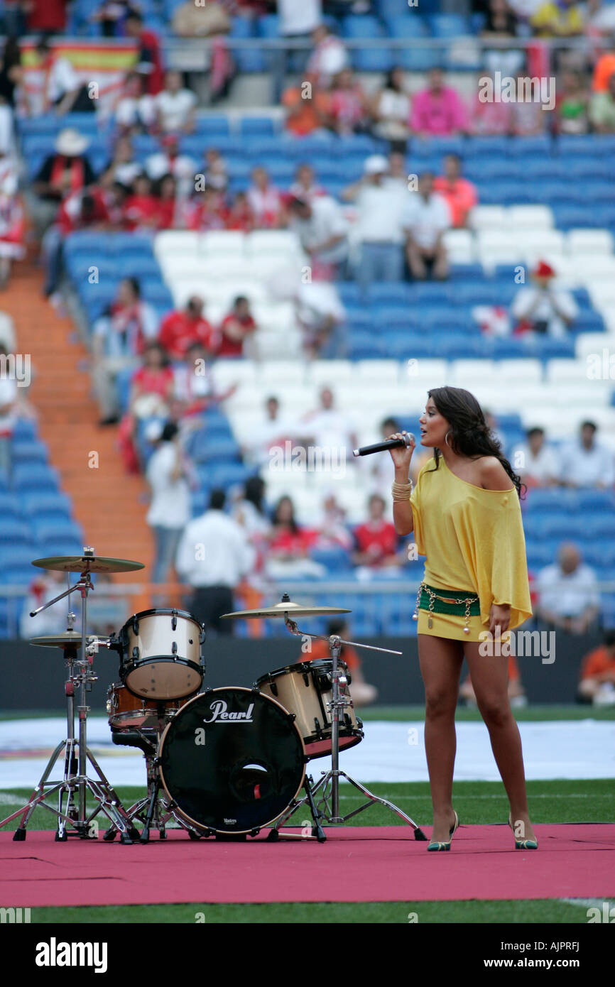 The singer Lorena performing before the match Stock Photo - Alamy