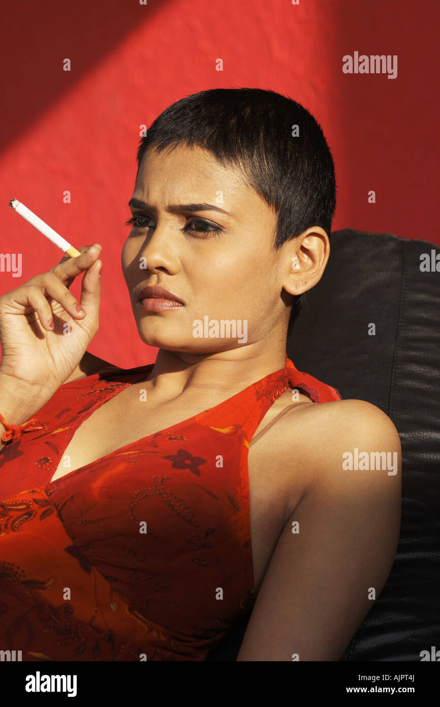 Close up of a female model smoking Stock Photo - Alamy