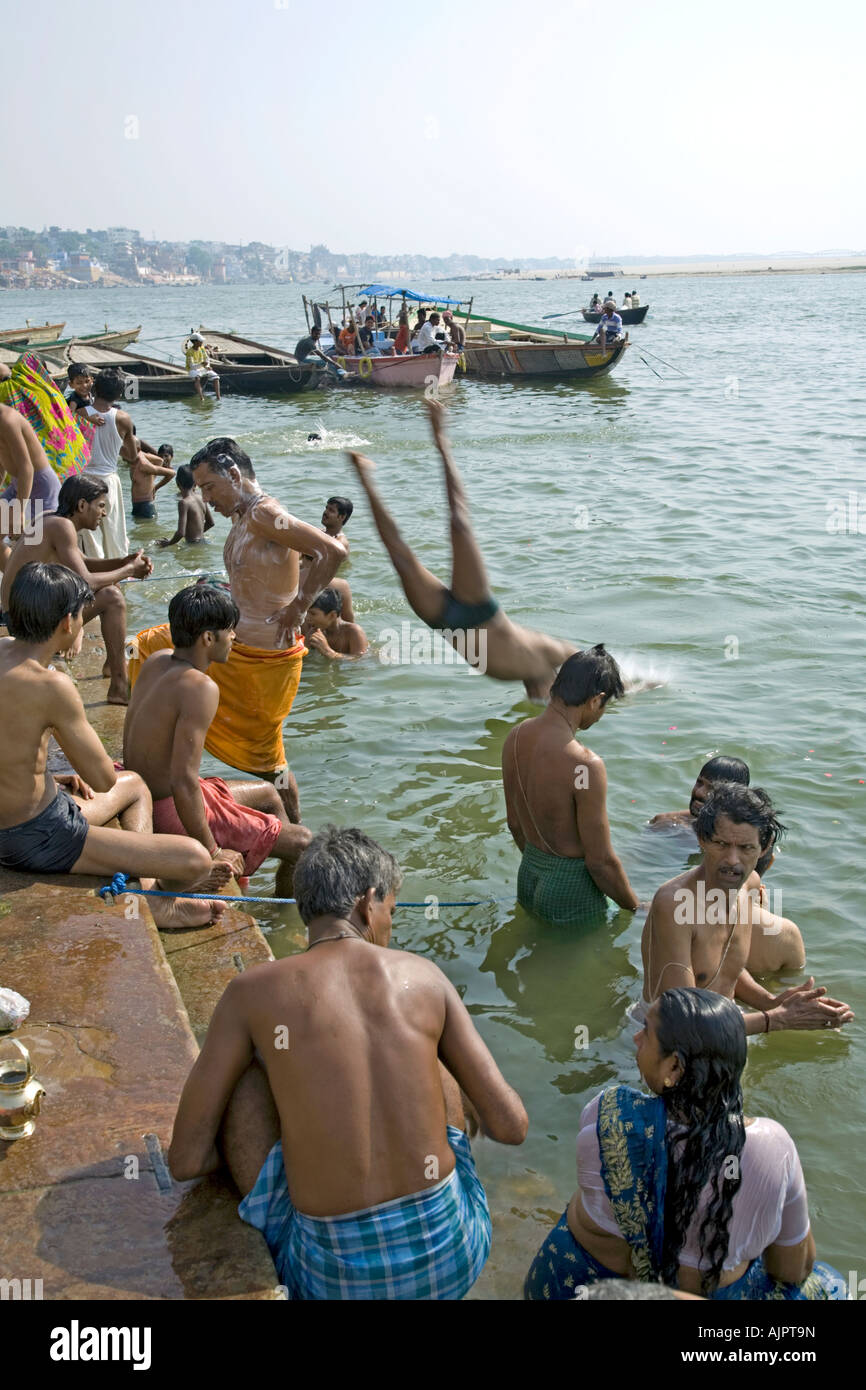 Ritual morning bath. Bachraj Ghat. Ganges river. Varanasi. India Stock ...