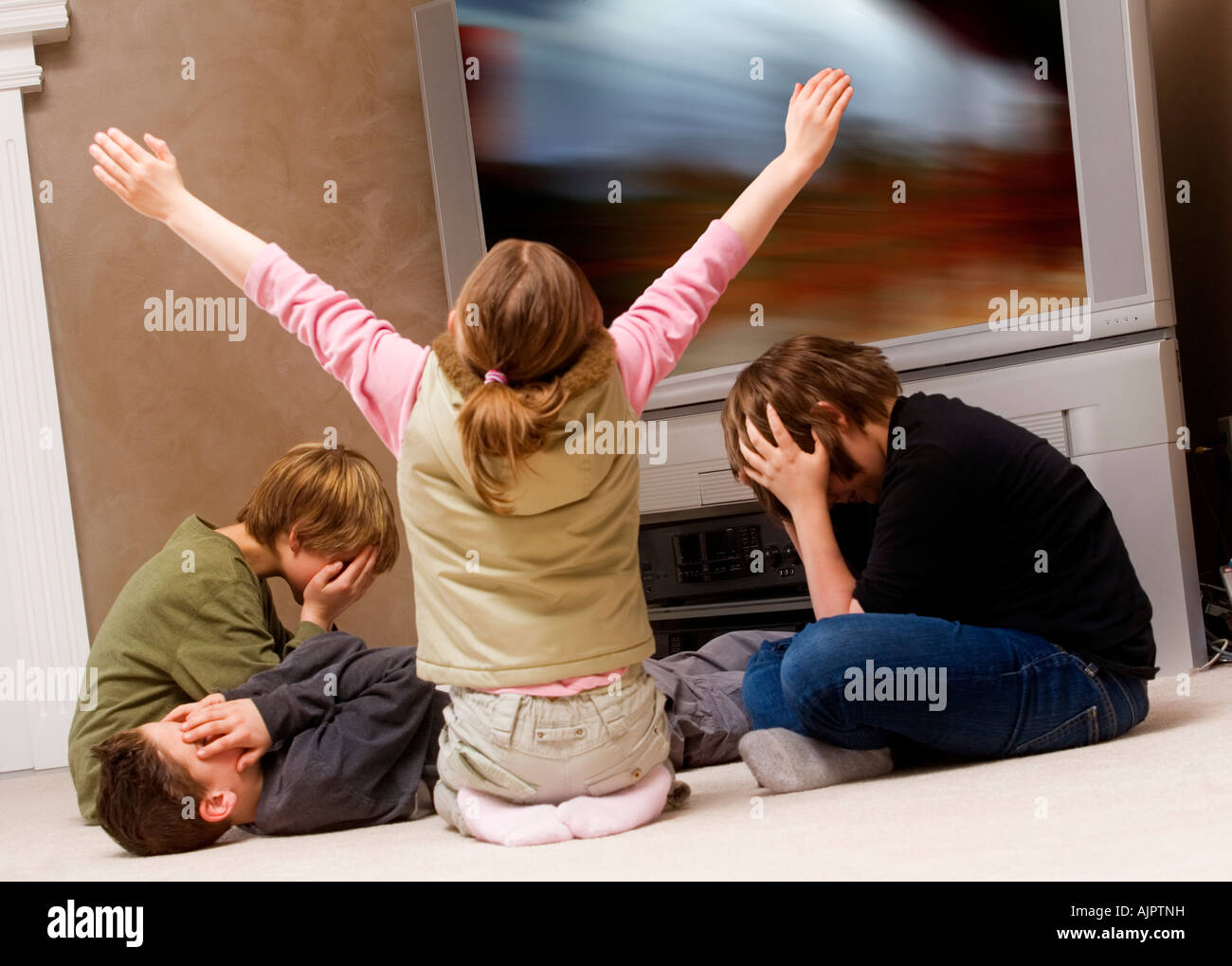 Girl winning a video game Stock Photo - Alamy