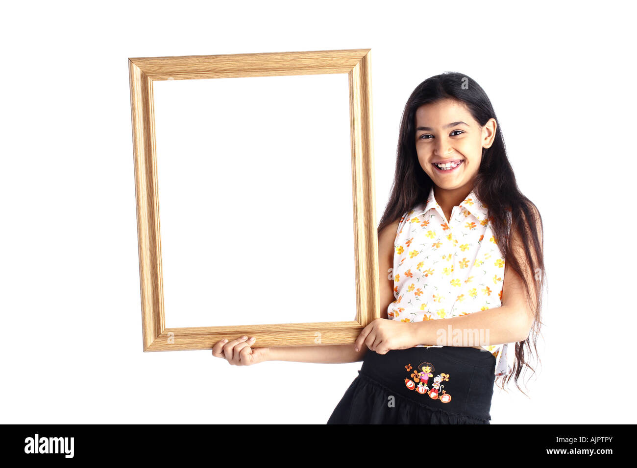 A girl holding an empty photo frame Stock Photo - Alamy