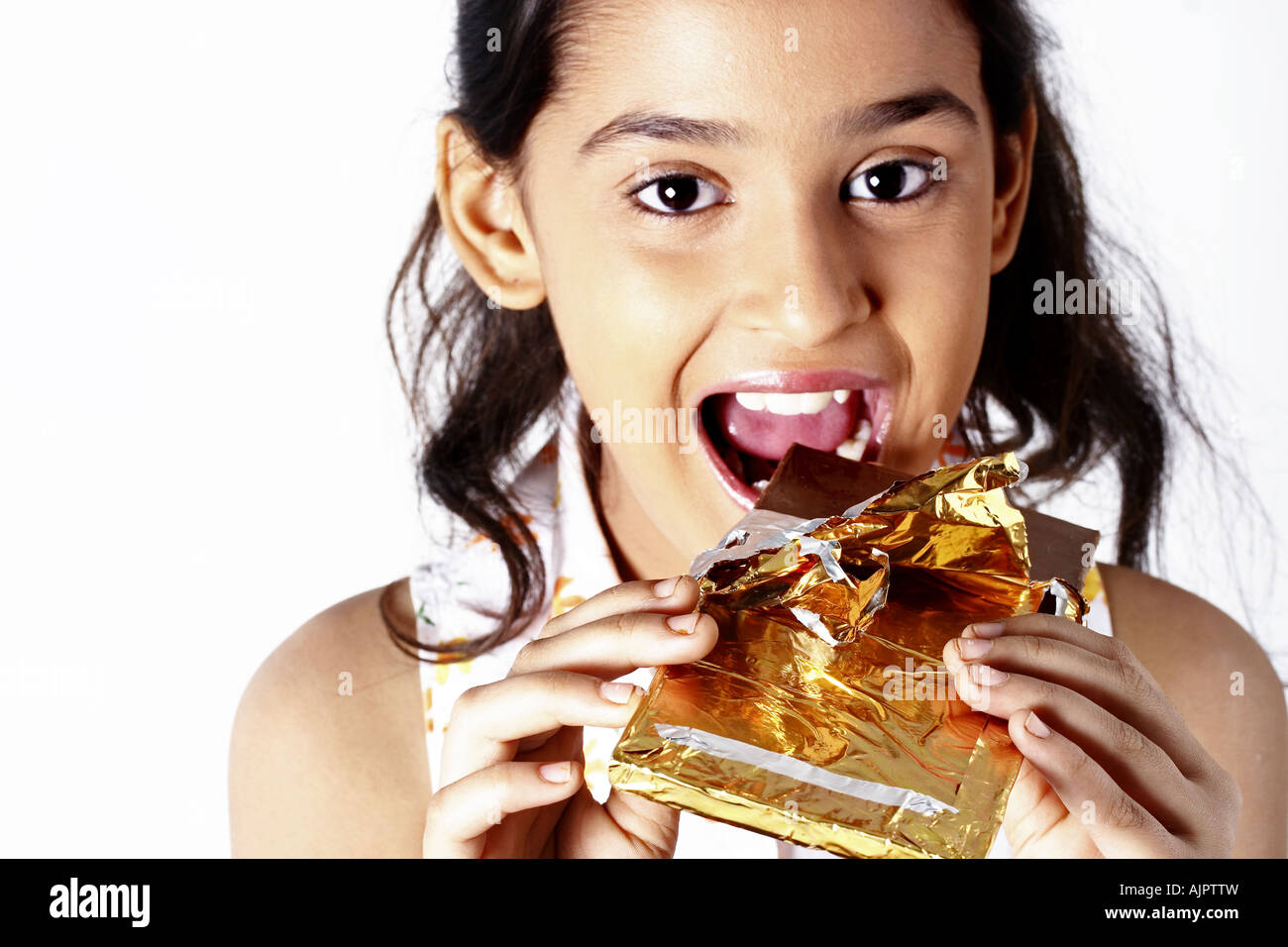 Indian people eating chocolate hi-res stock photography and images - Alamy