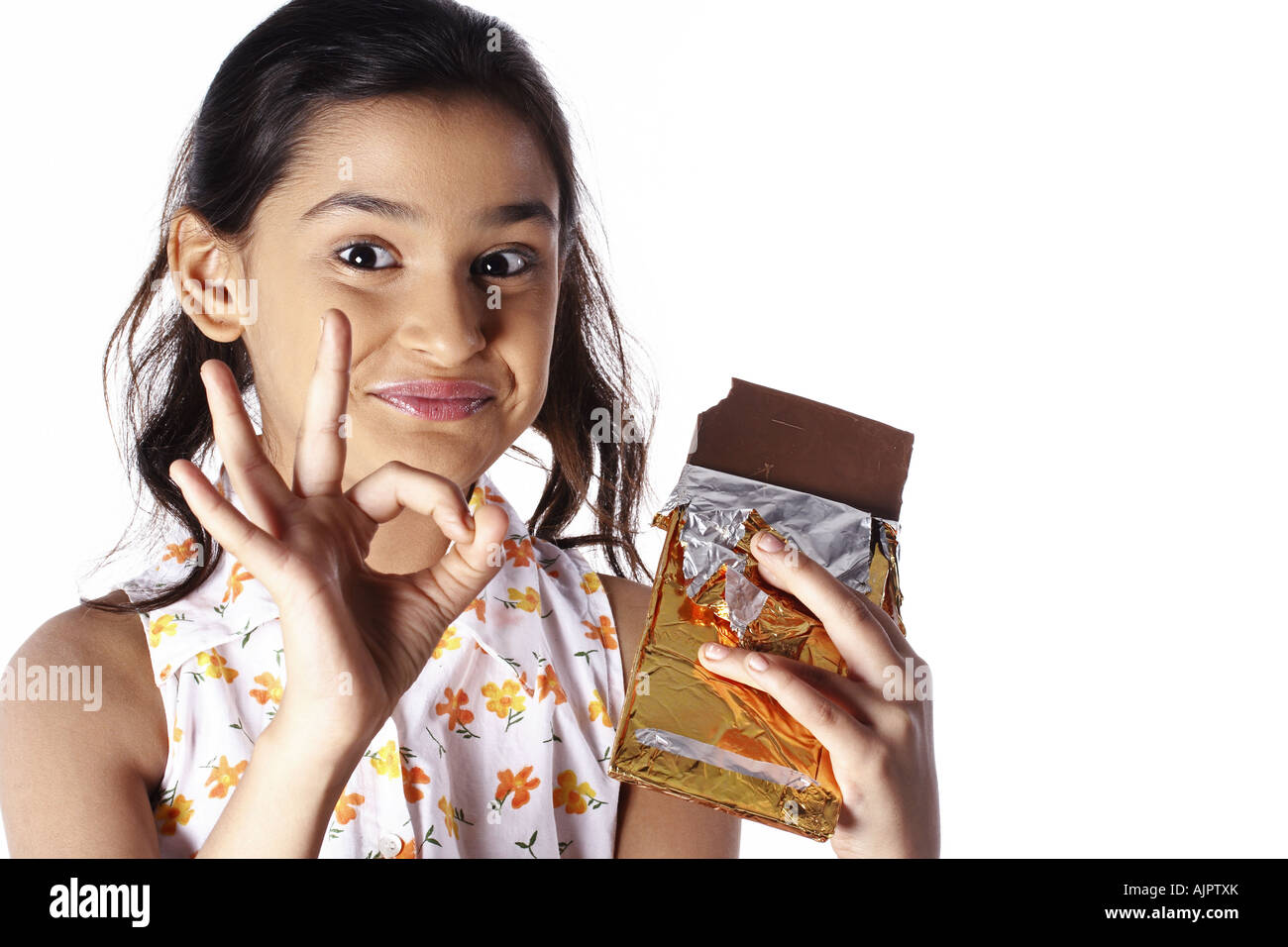 Indian people eating chocolate hi-res stock photography and images - Alamy