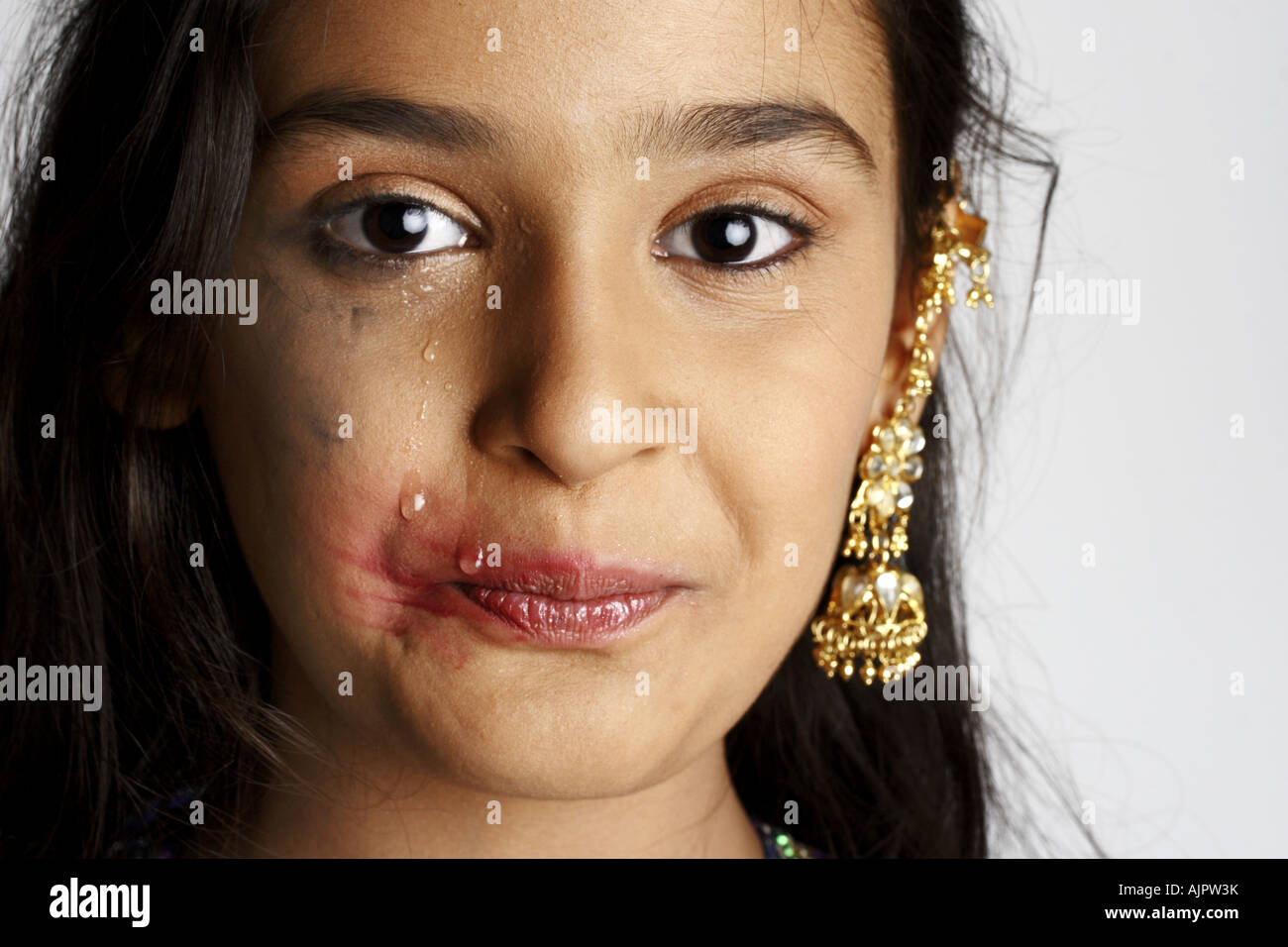 Indian child crying tears face hi-res stock photography and images - Alamy