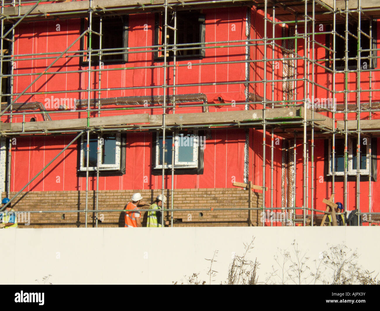 New homes being built, insulation cladding Stock Photo - Alamy