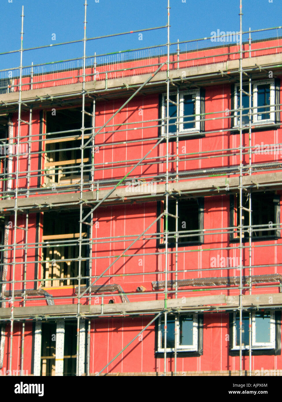 New homes being built, insulation cladding Stock Photo - Alamy