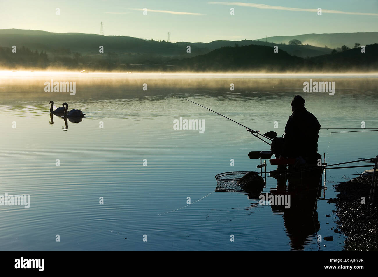 Fisherman at first light on Loch Ken, Scotland Stock Photo - Alamy