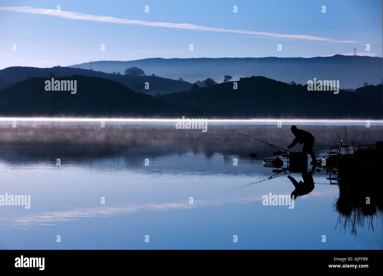 Fisherman at first light on Loch Ken, Scotland Stock Photo - Alamy