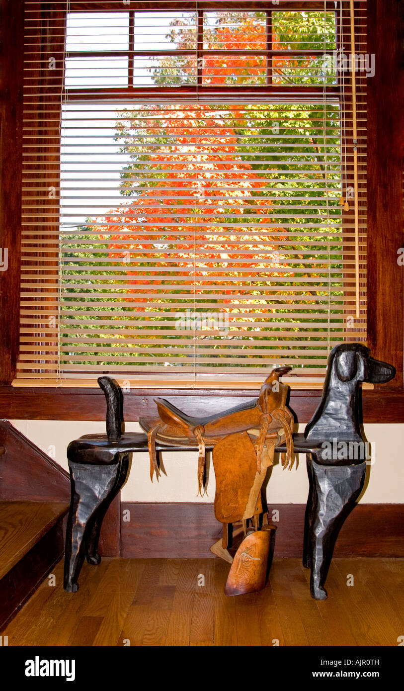 Wood Window Blinds, saddle and fall foliage Stock Photo - Alamy