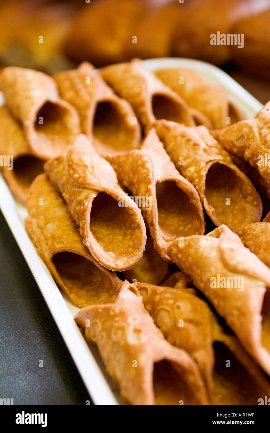 Close up of canole shells on a tray Stock Photo - Alamy