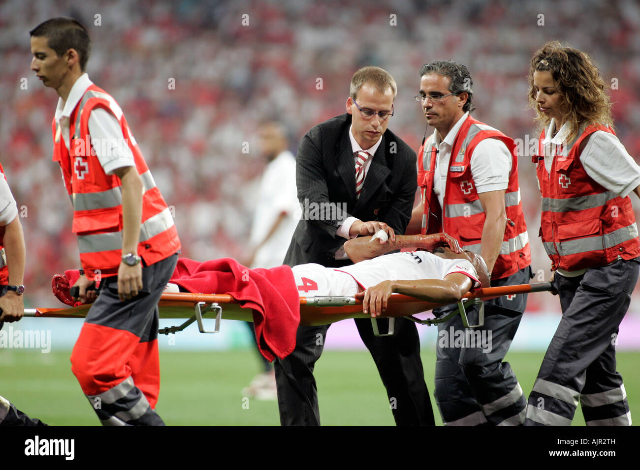 Stretcher on football pitch hi-res stock photography and images - Alamy