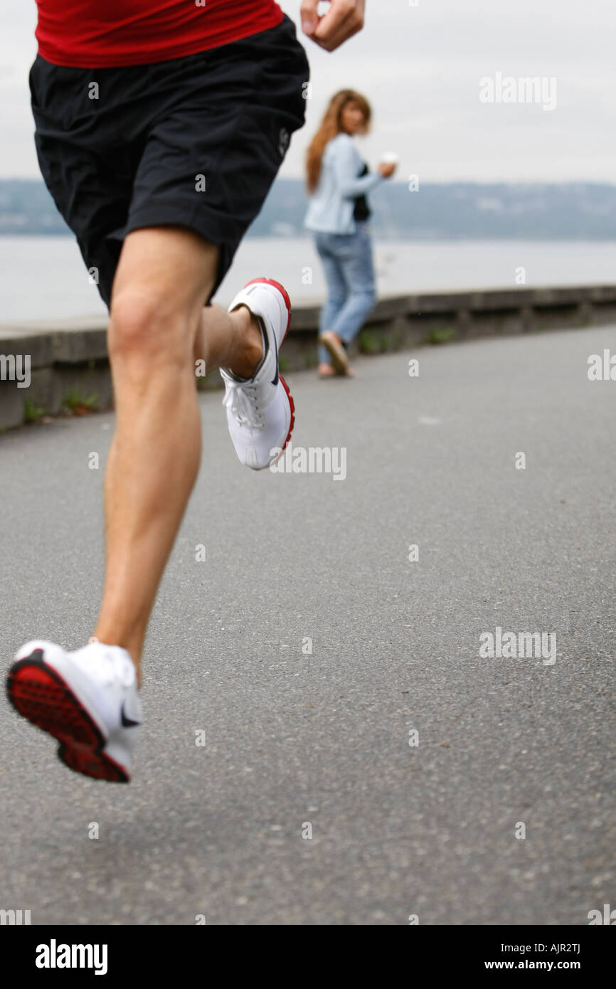 fit muscular hard body male personal trainer exercising outdoors Stock ...