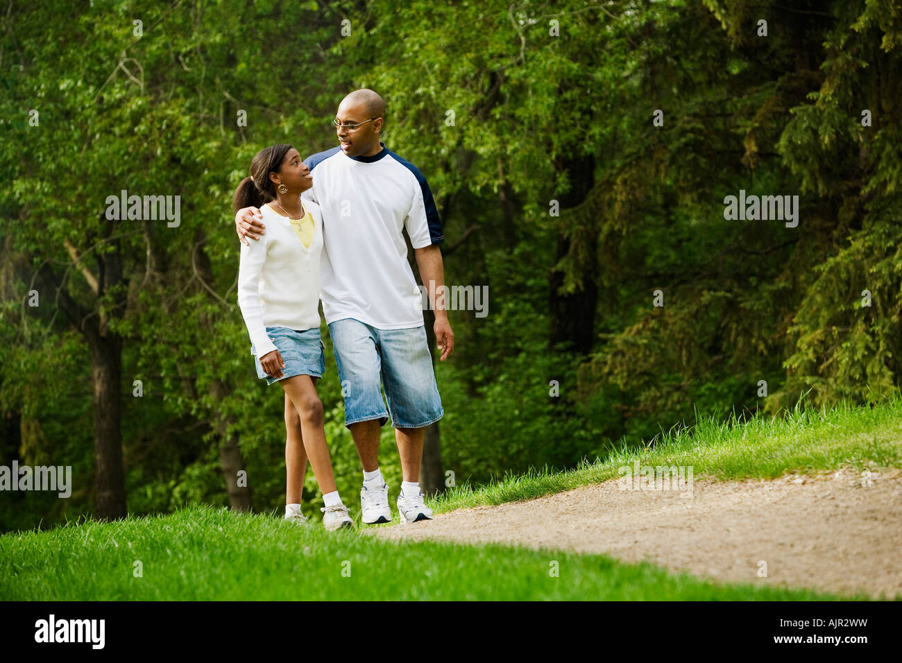 Father teenage daughters walking hi-res stock photography and images ...