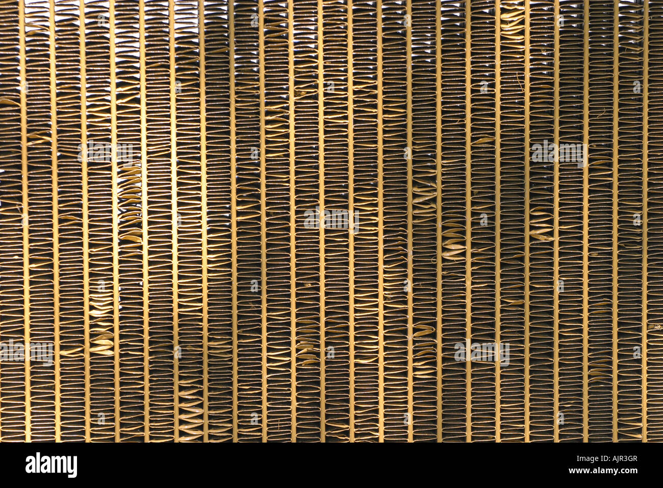 yellow radiator grille pattern Stock Photo - Alamy