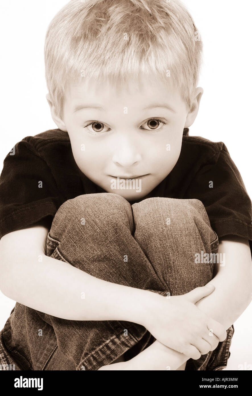 Front view of a boy looking at camera Stock Photo - Alamy