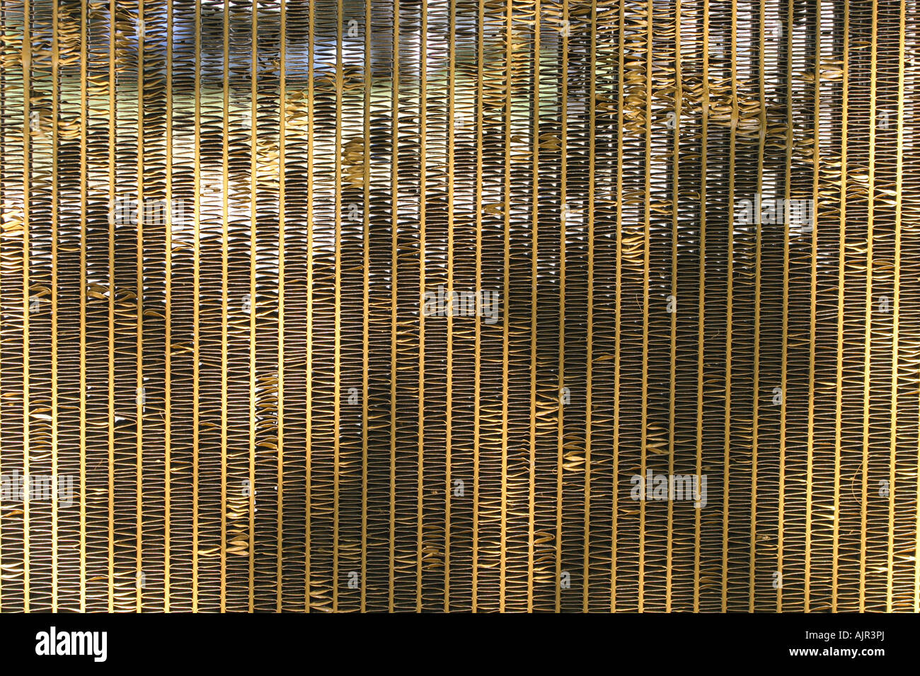 yellow radiator grille pattern Stock Photo - Alamy