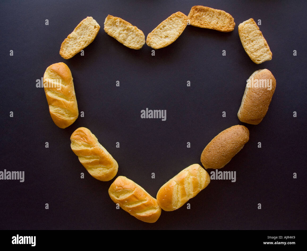 composition of different bread types - bun baguettes - arrangend in a ...
